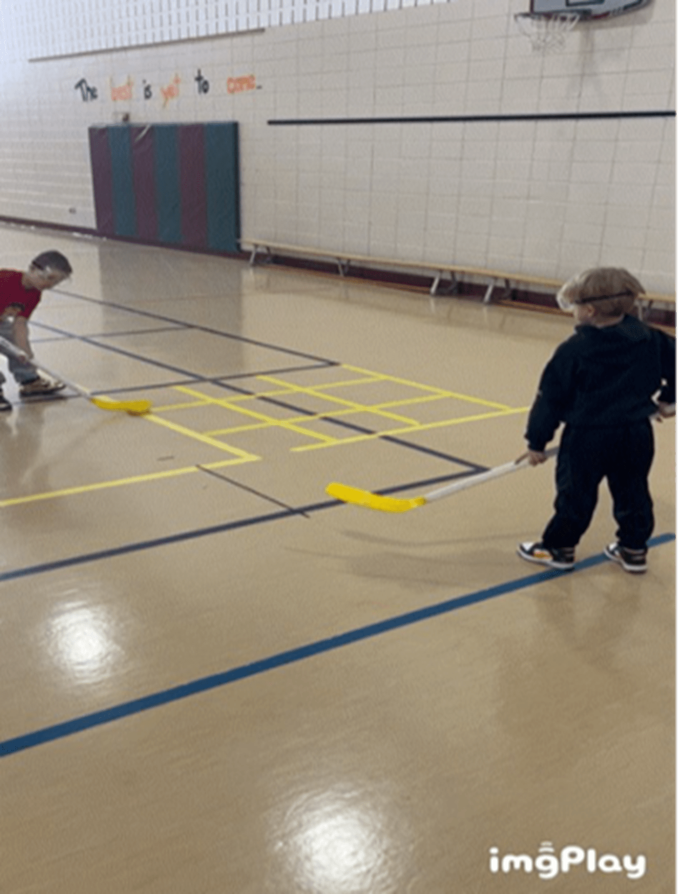 Elementary PE Floor Hockey Tournament in Action